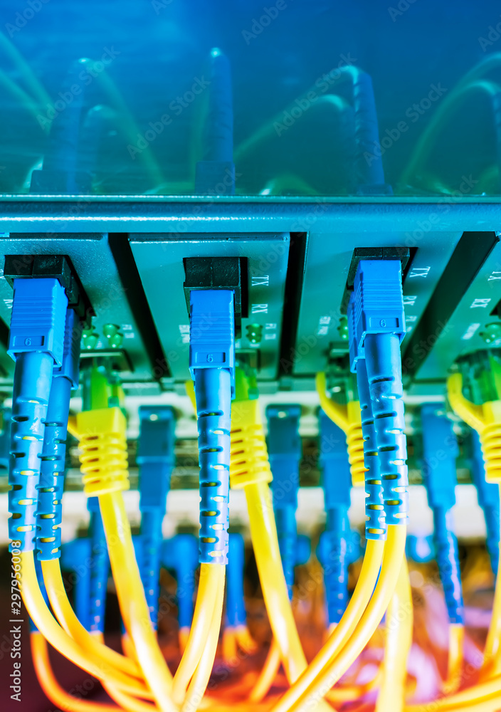 Fiber Optic cables connected to optic ports and UTP, Network cables ...
