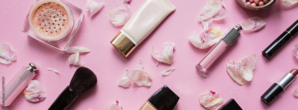 Make up items on pink color background. Horizontal web banner. Set of ...