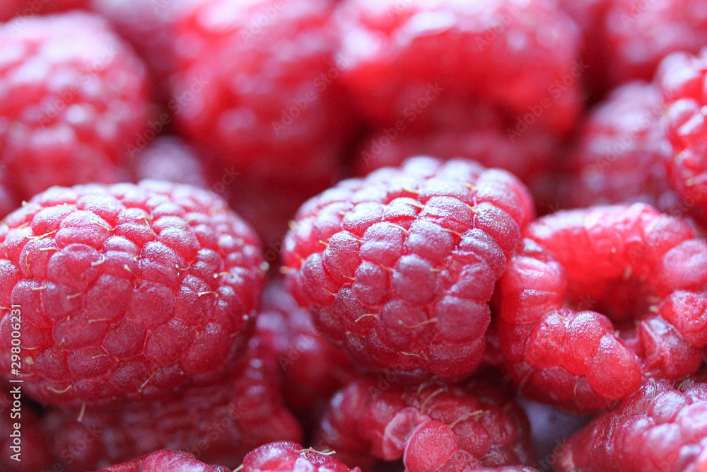 Background with fresh raspberry closeup. Raspberry macro photography ...