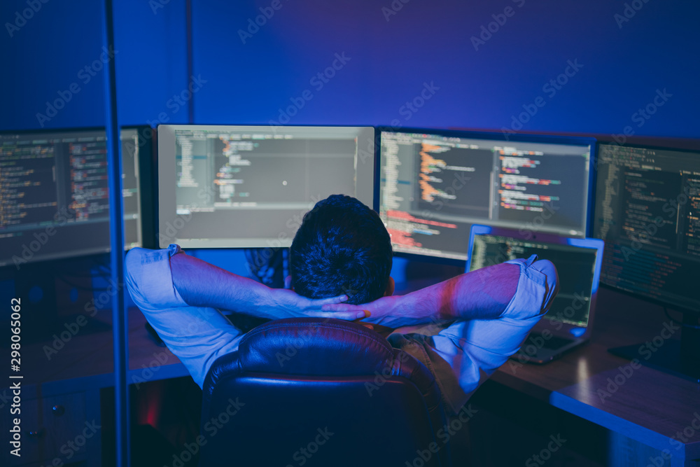 Rear behind view photo of it skilled specialist guy sitting comfy ...