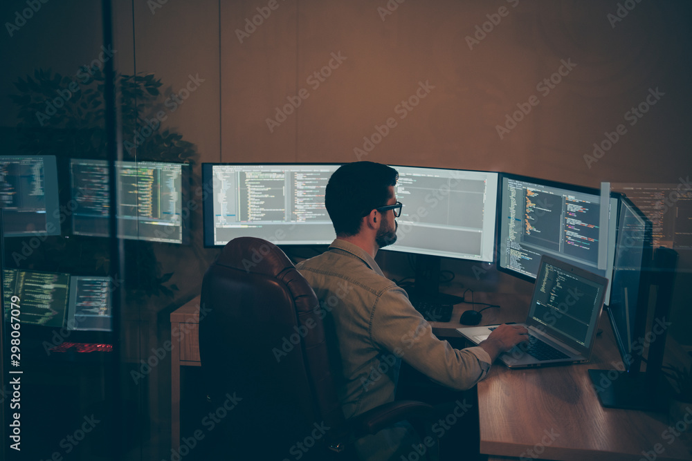 Photo of it-specialist working on global project using laptop testing ... Photo of it-specialist working on global project using laptop testing ...