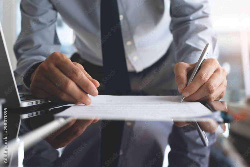 Signing contract Stock Photo | Adobe Stock