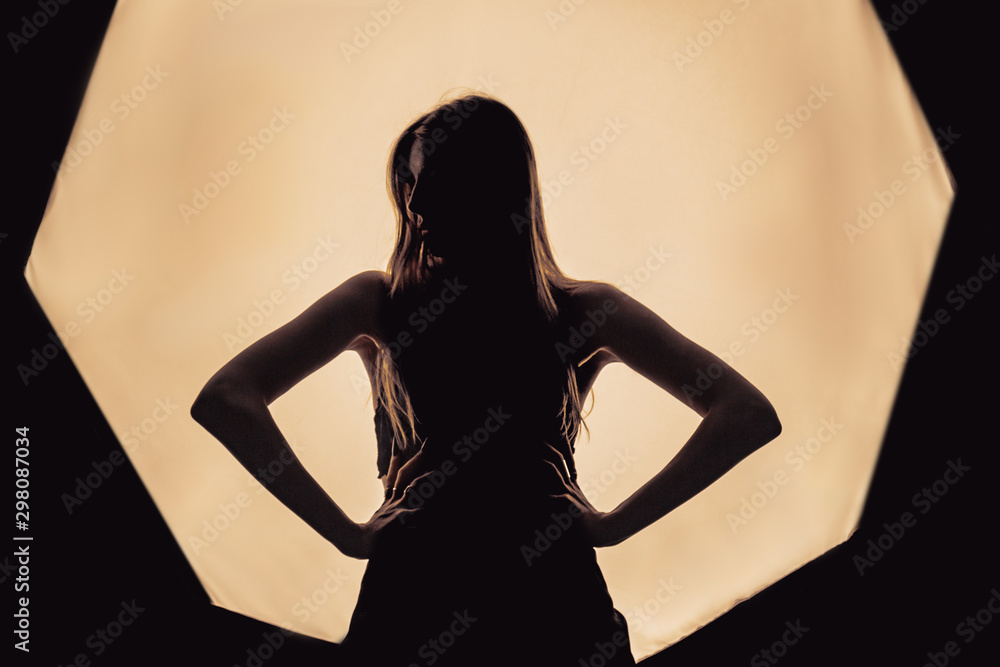 A girl with a bare back, severe thinness and protruding ribs. The ...