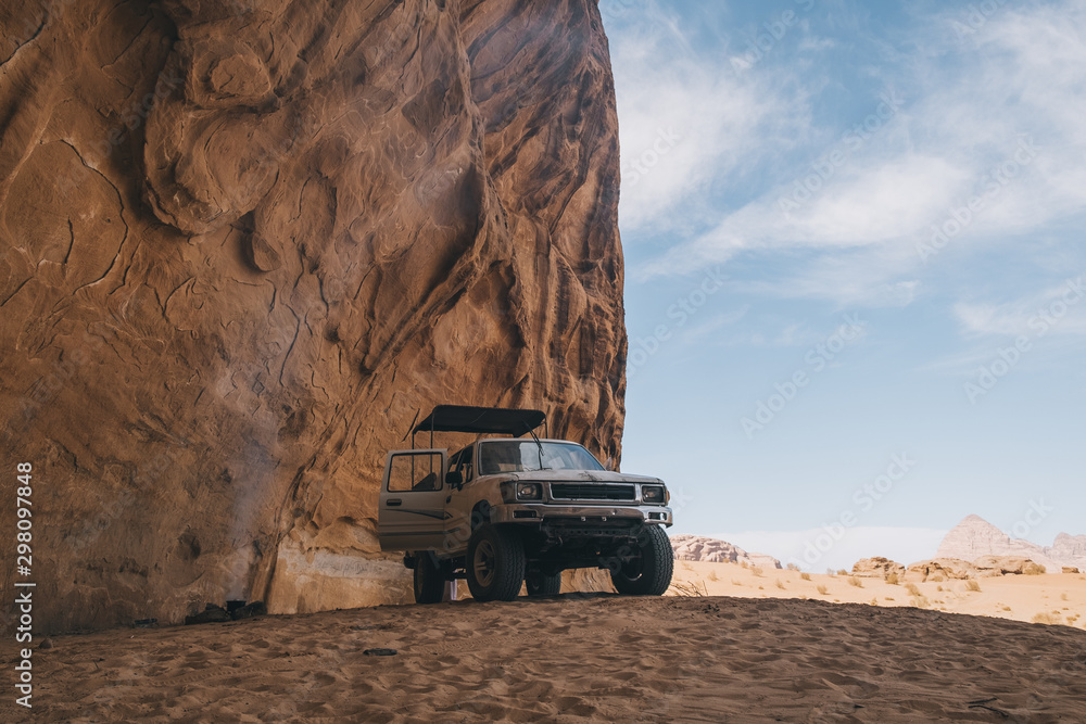 A typical 4-wheeler jeep in Wadi Rum desert during lunch time Stock ...