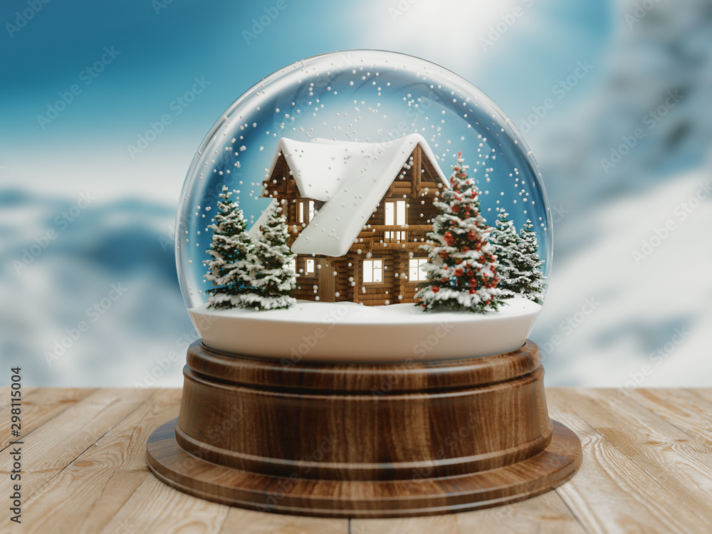 Beautiful snow ball or snowglobe with snowfall and mountain house ...