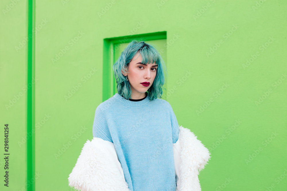 Teenage girl with blue hair Stock Photo | Adobe Stock
