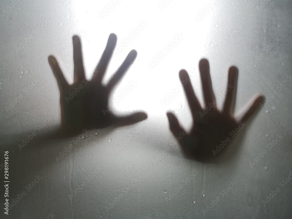 shadow of the right hand and left behind the glass is wet. Stock Photo ...