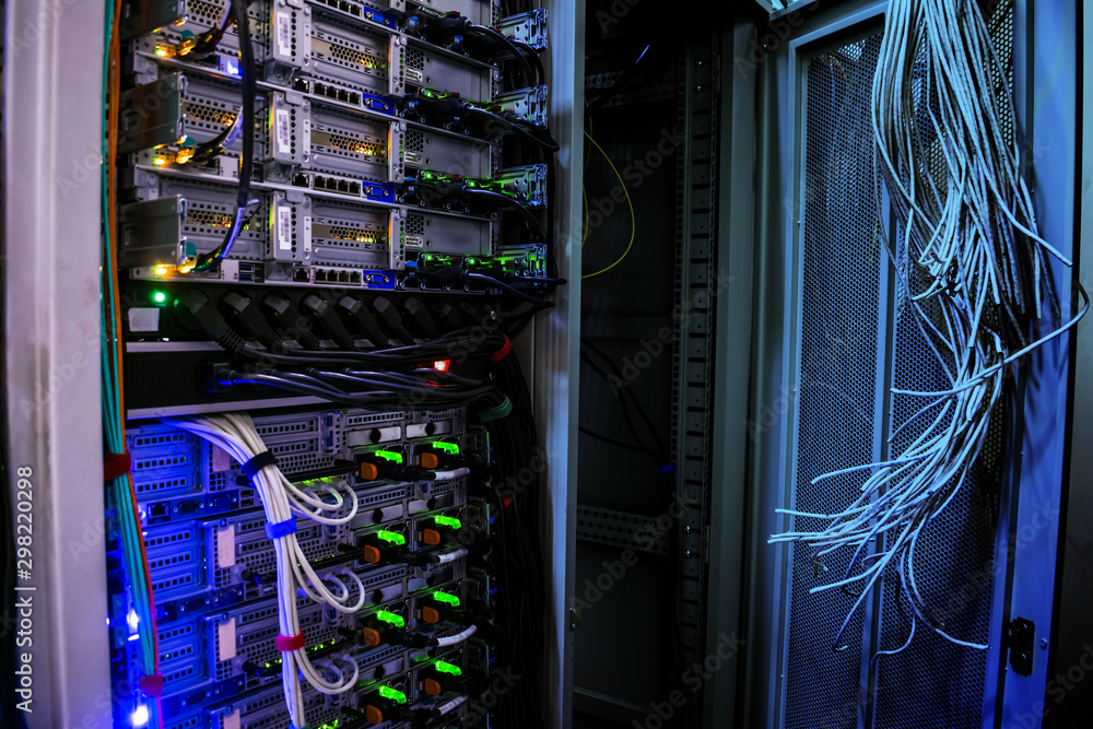 Foto de Working and empty racks with server equipment are in the data ...