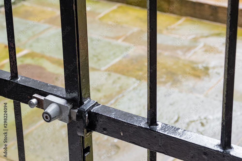 Detailed view of a locked jail and dungeon entrance area, once ...