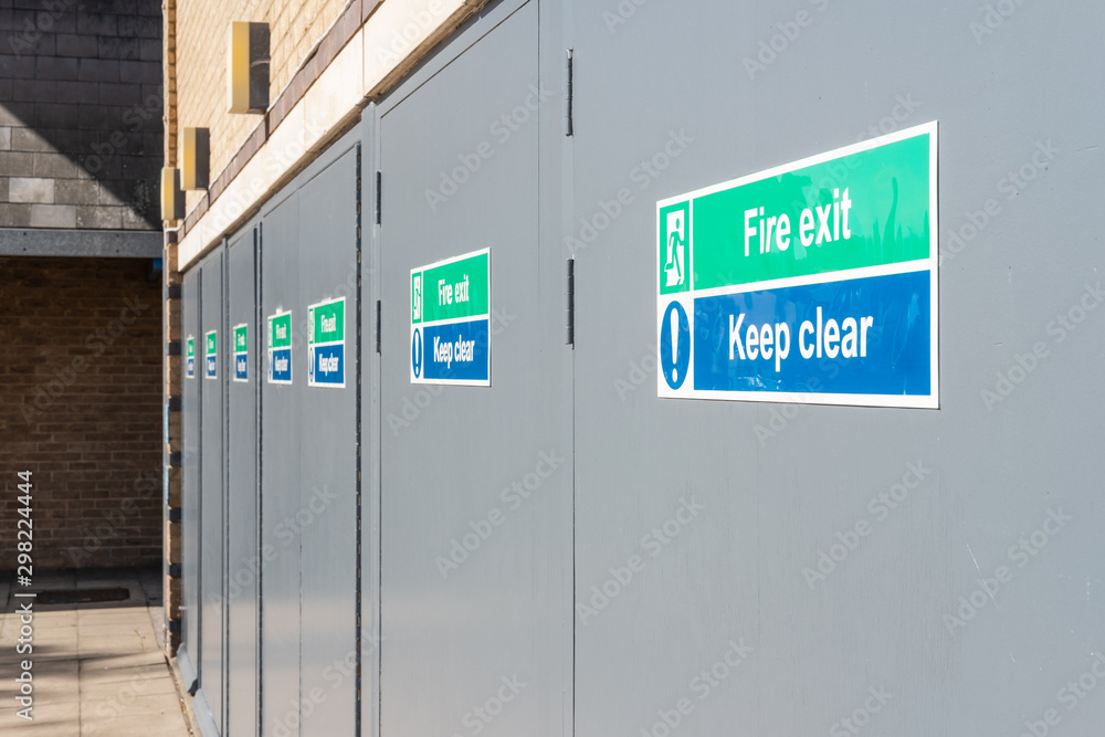 Abstract view of Fire Exit doors seen at the rear of a shopping arcade ...