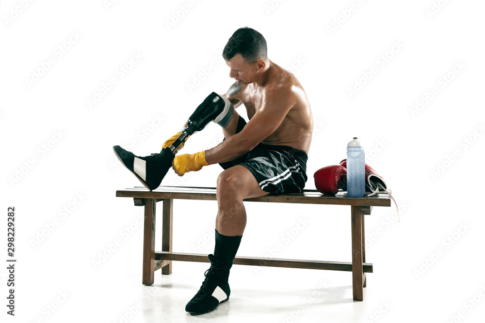 Full length portrait of muscular sportsman with prosthetic leg, copy ...