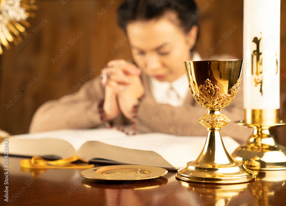 Kneeling In Prayer At Altar