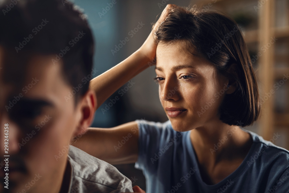 Sad woman crying while having relationship problems with her boyfriend ...