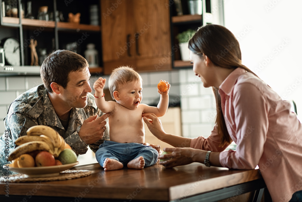 Happy military family having fun together at home. Stock Photo | Adobe ...