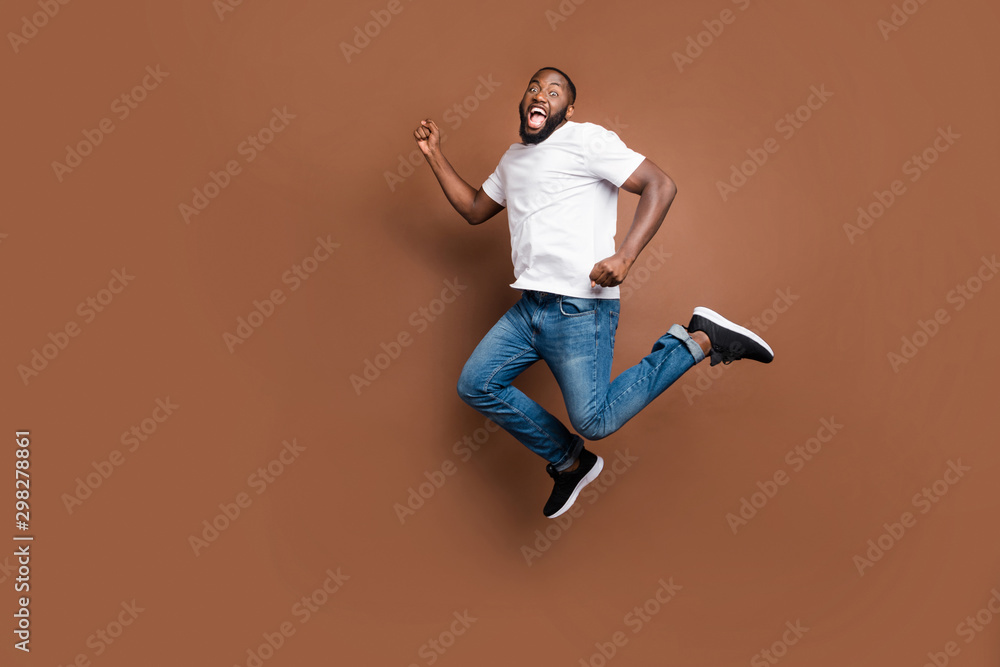 Full length body size photo of urgent jumping running shouting guy ...