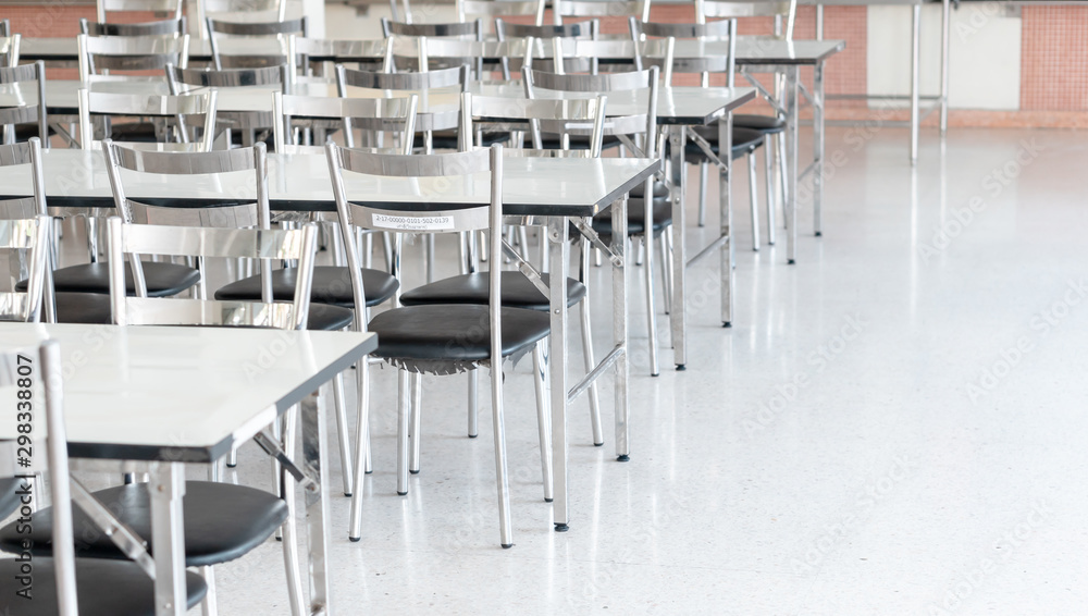 Stainless steel tables and chairs in high school student canteen ...
