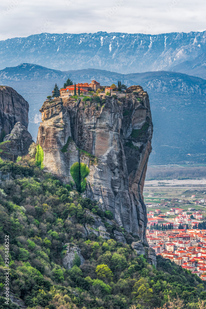 Meteora with monastery of Holy Trinity and Kalambaka town Stock Photo ...