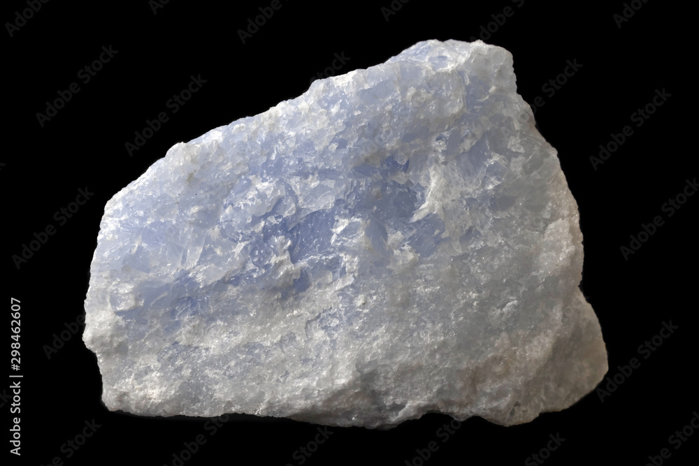 Rock of blue calcite mineral from Brazil isolated on a pure black ...