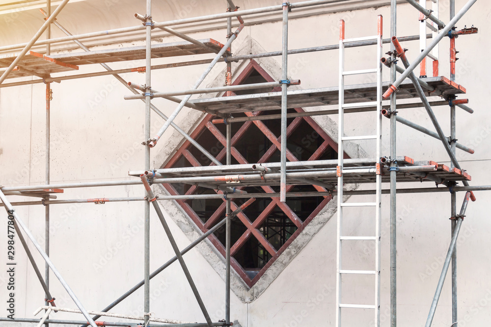 Photo & Art Print Construction scaffolding as temporary structure for ...