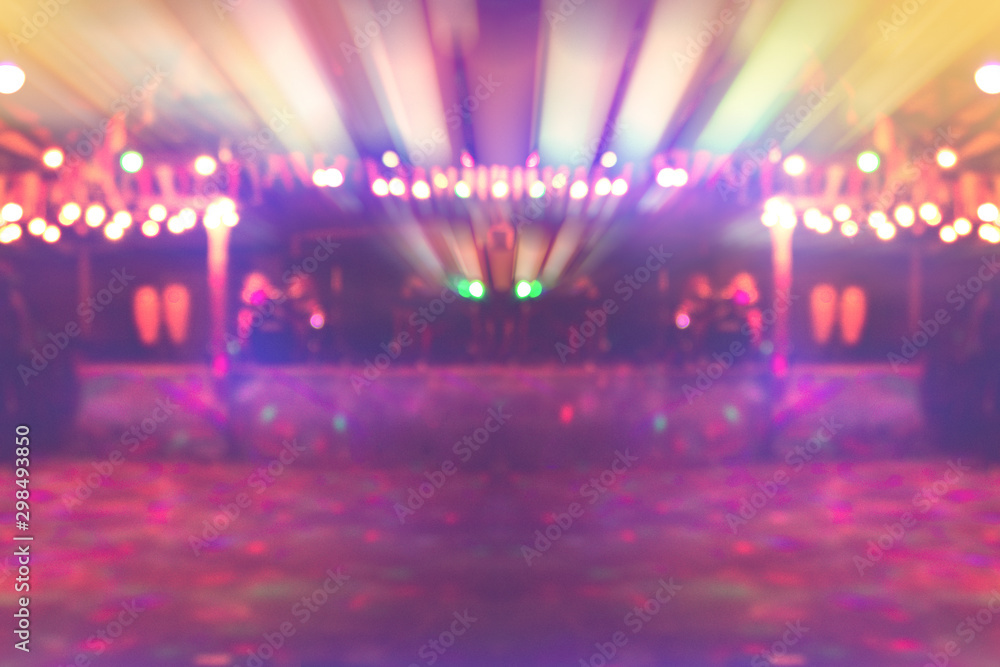 empty dancing stage in nightclub with colourful lighting background ...