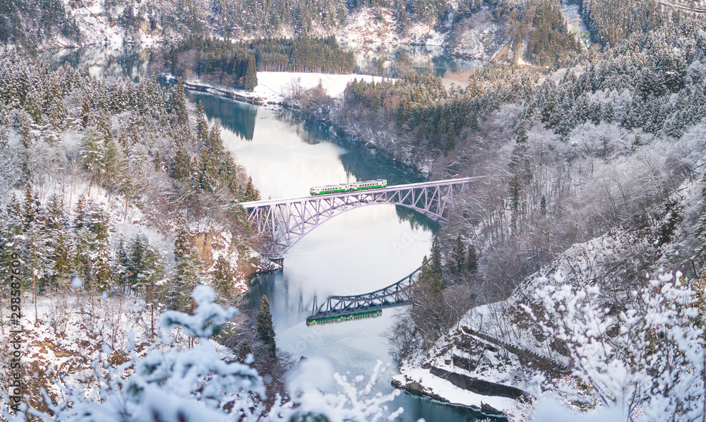 Winter View of Tadami Railway Line And Bridge Reflection in The Valley ...