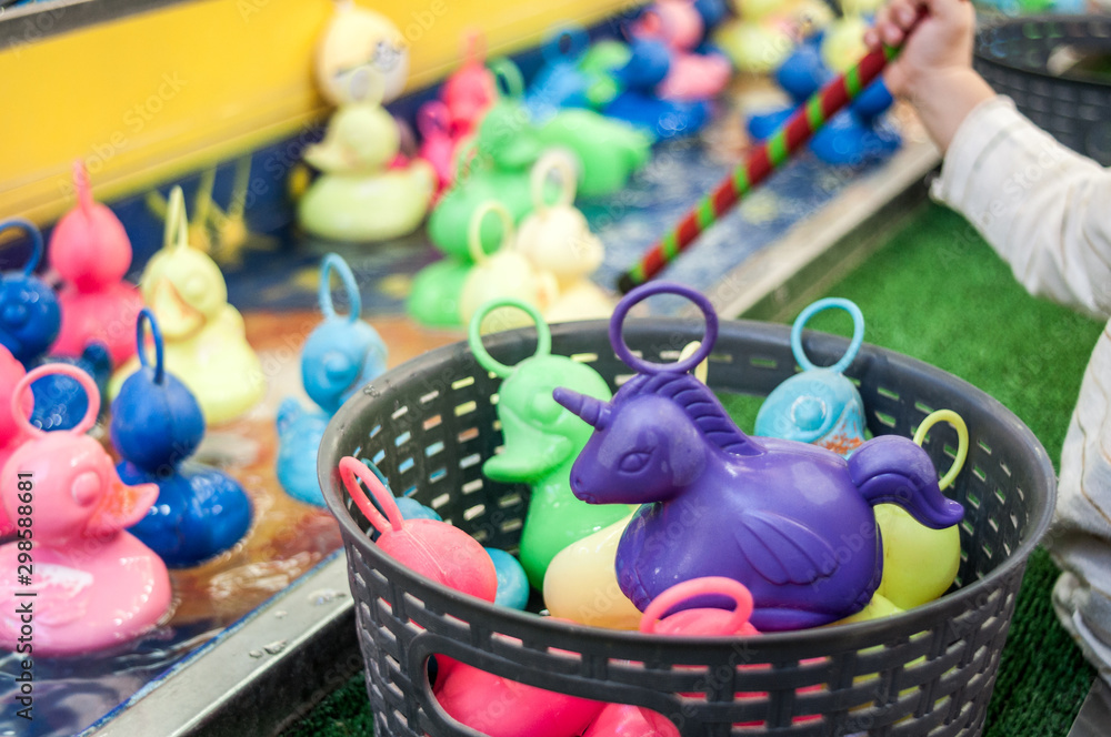 Rubber colorful ducks with hooks in their heads (funfair ducks) Stock ...