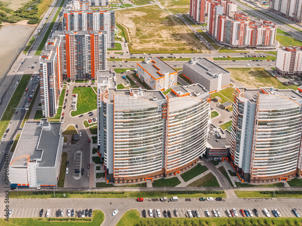 Newly built houses. Construction of high-rise buildings. Multistory ...