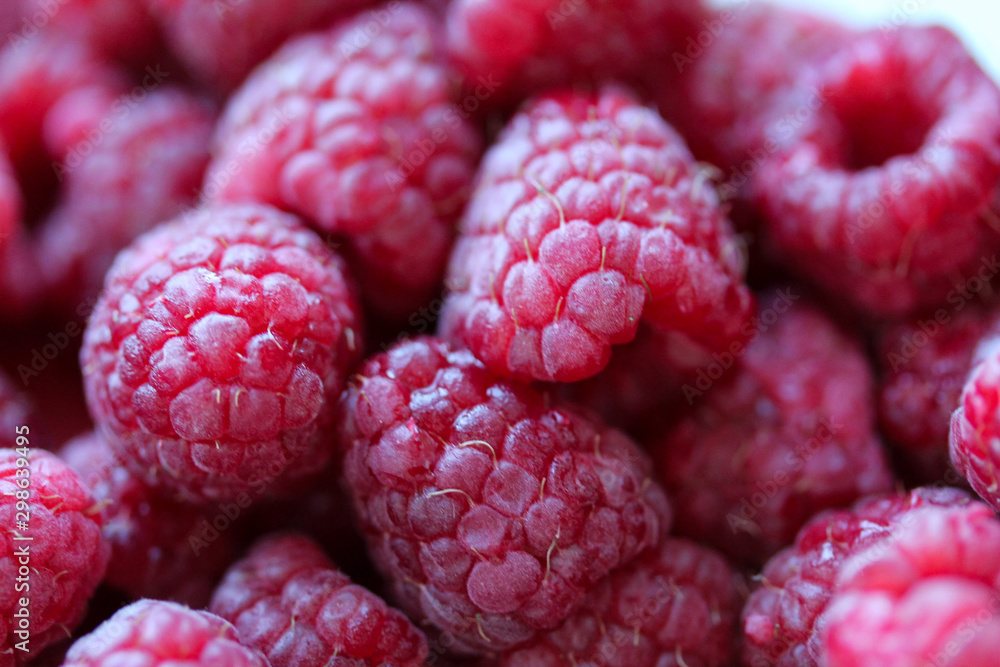 Background with fresh raspberry closeup. Raspberry macro photography ...