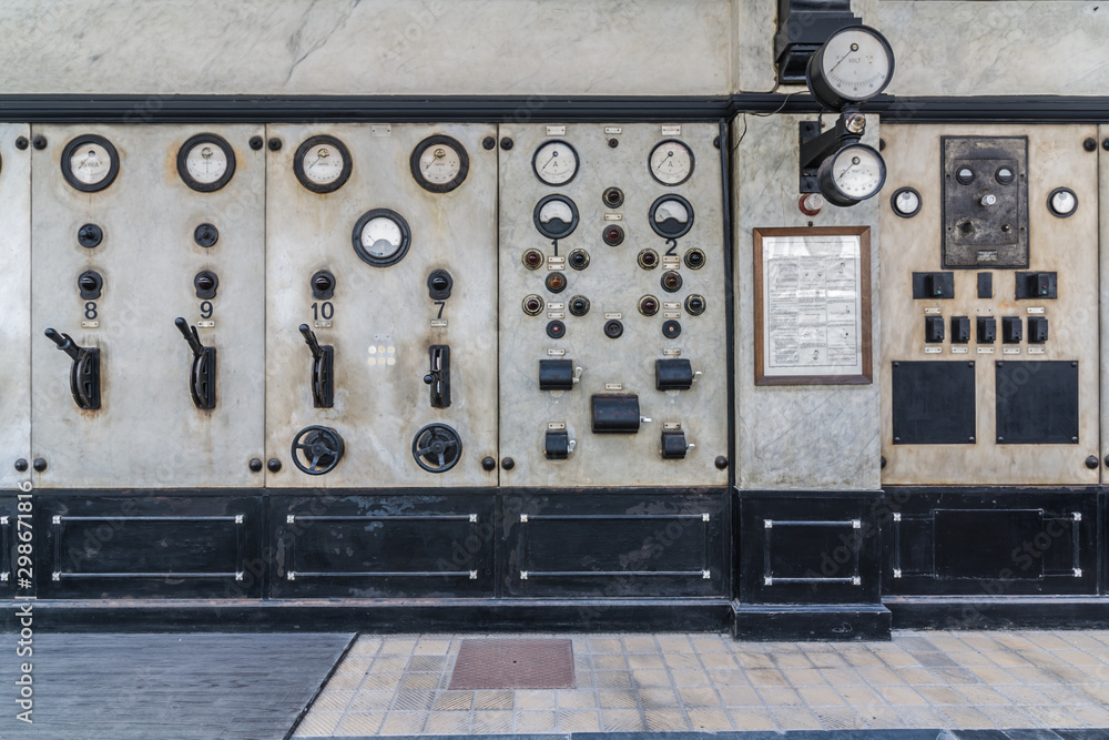 Dials and switches in the control room in old power plant. Control ...