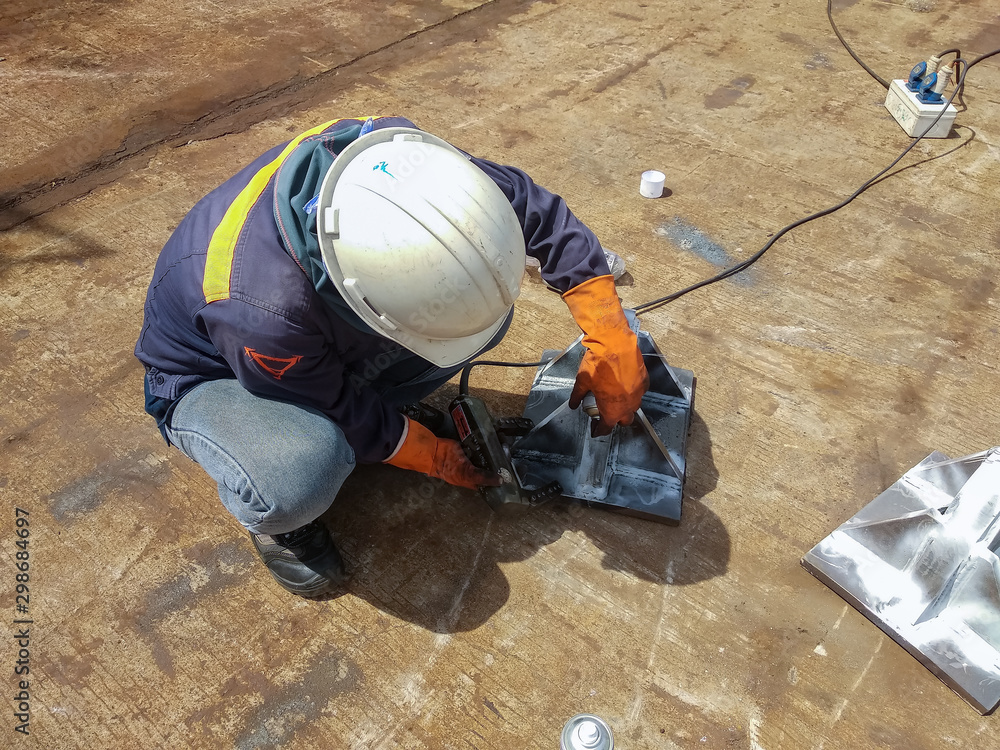 Inspector are doing the welding inspection by process Magnetic Particle ...