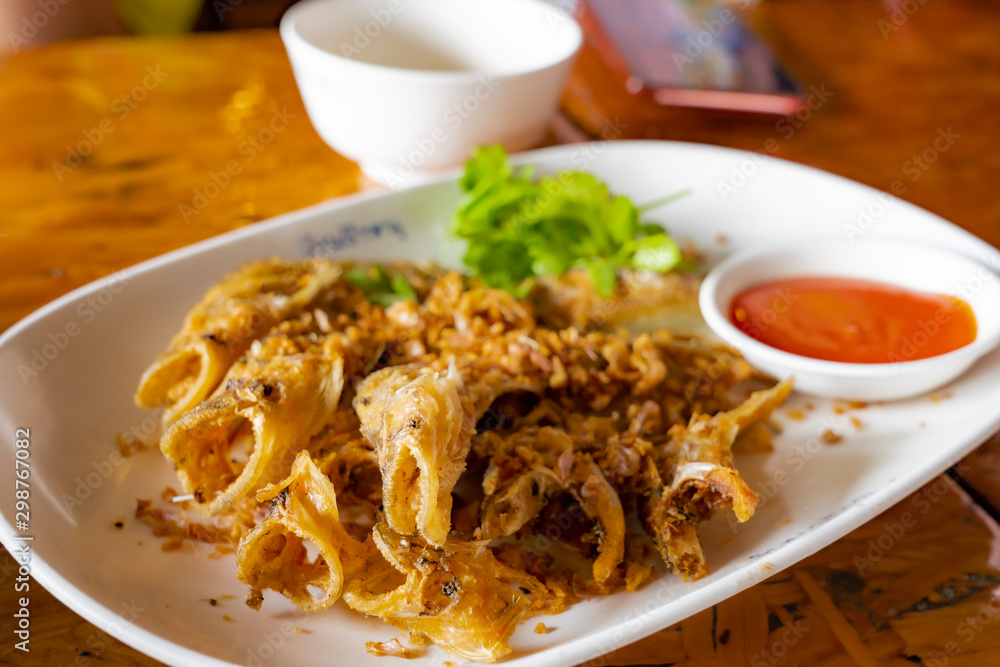 Closed up deep fried Thai style river fish (Sheatfish Fried) “Par Nae ...