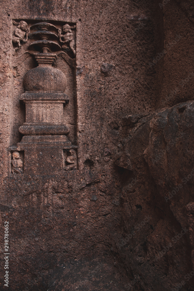 The Kanheri Caves are a group of caves cut into a massive basalt ...
