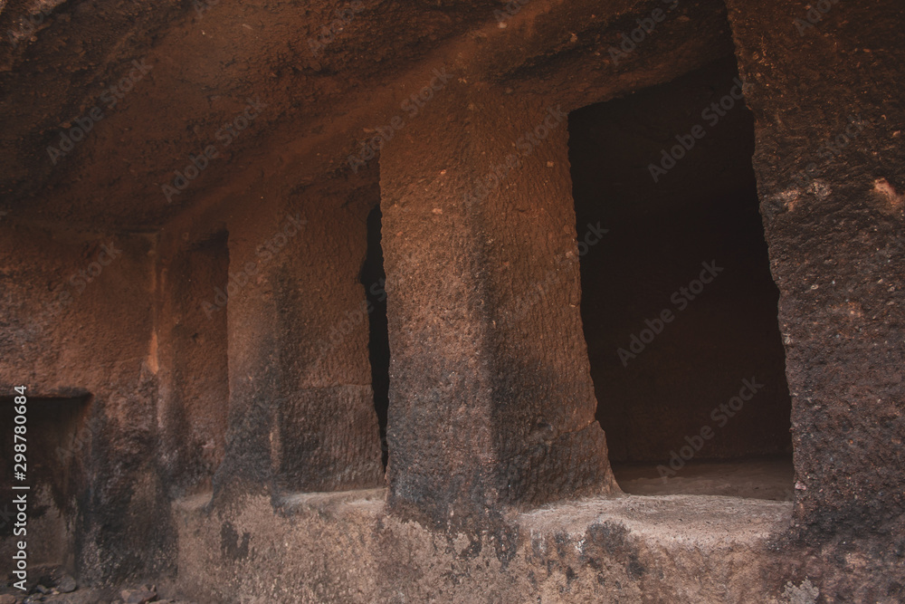The Kanheri Caves are a group of caves cut into a massive basalt ...