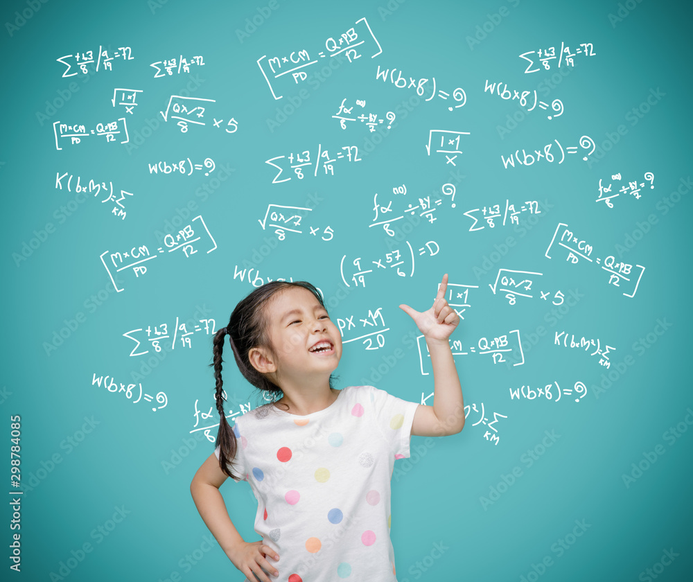 Asian child girl pointing at the blackboard with imagination the ...