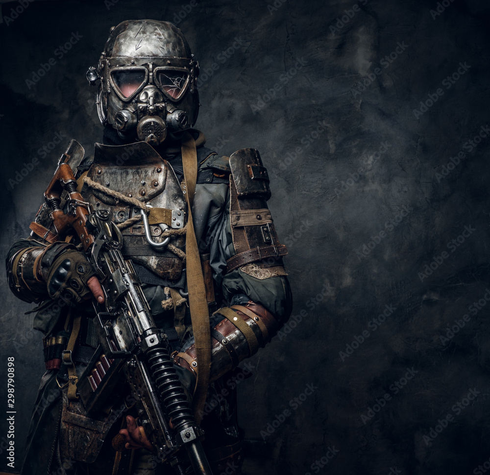 Man is wearing great costume of futuristic knight in gas mask and is ...