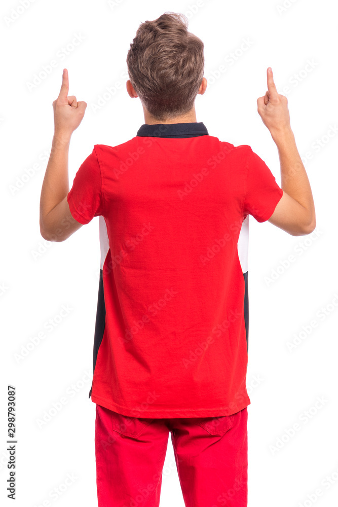Back view. Teen boy pointing finger away at copyspace, isolated on ...