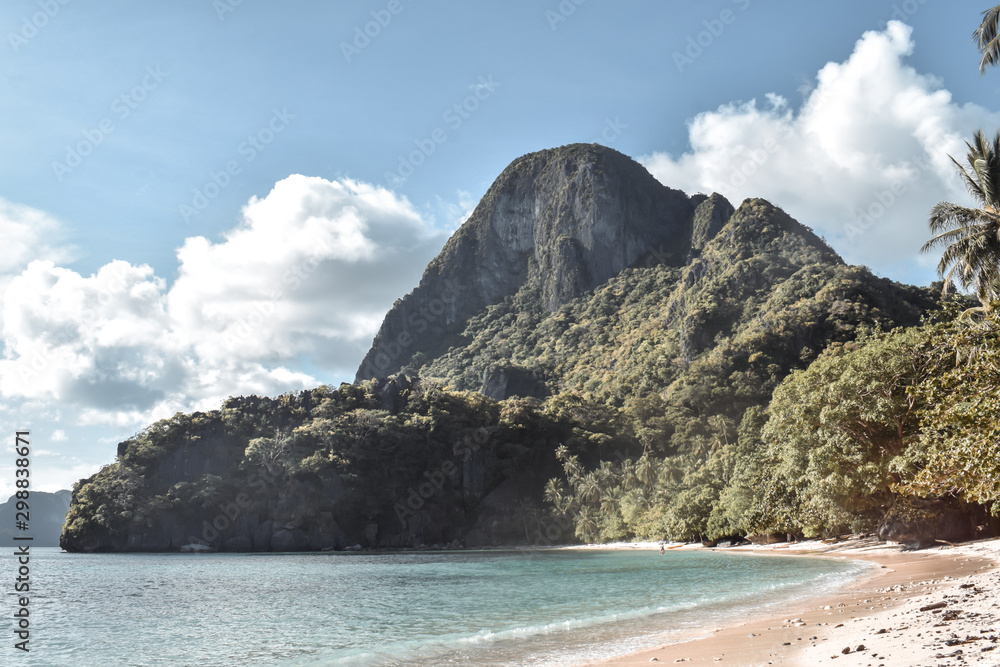 Limestone rock on a beautiful tropical Paradise beach in El Nido ...