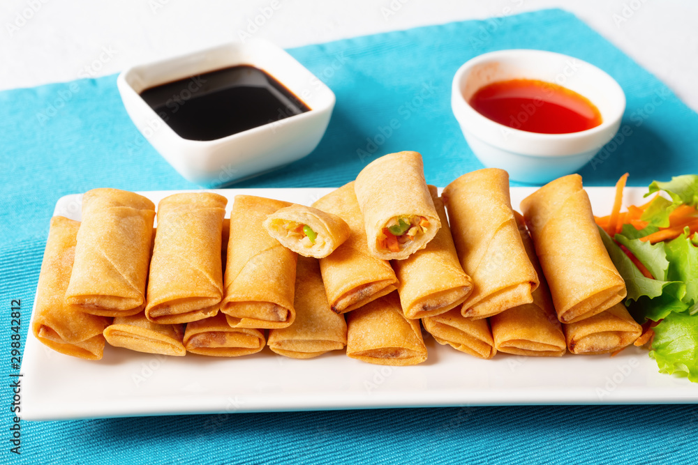 crispy bite sized chinese spring rolls, close-up Stock Photo | Adobe Stock