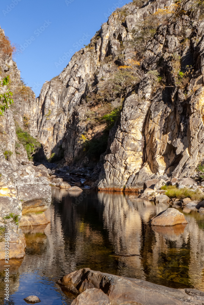 Bandeirinhas Canyon in the afternoon sunlight, with rocky walls and ...