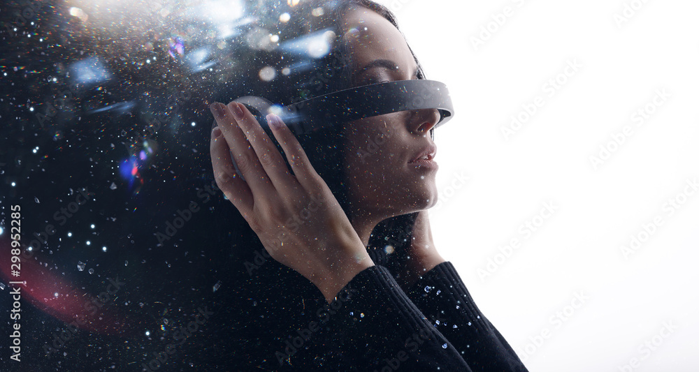 Double exposure of female face. Abstract woman portrait. Digital art. Girl in glasses of virtual ...