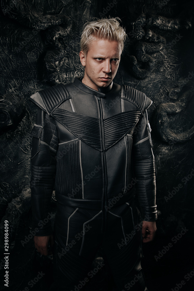 Ready for new discovery. Portrait of concentrated young cosmonaut with ...