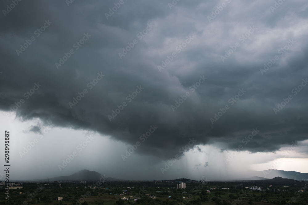 Heavy down pour/cloud burst over the distant hill/mountains in Pune ...