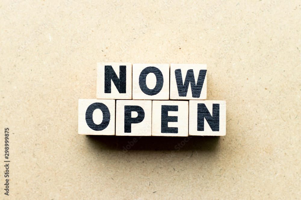 Letter block in word now open on wood background Stock Photo | Adobe Stock