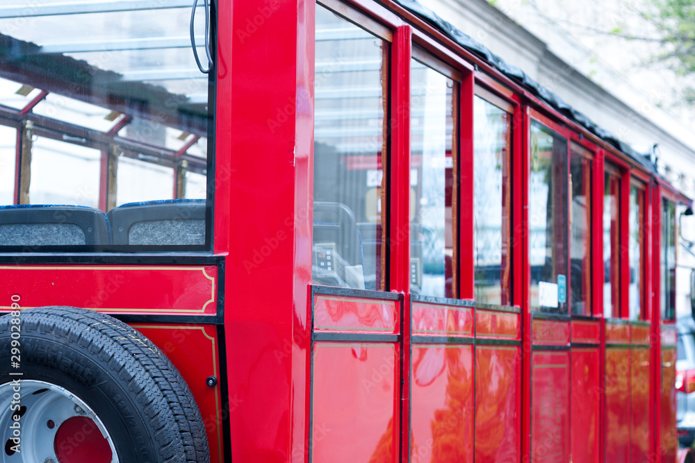 detail of a vintage empty red tram. old style transport. turistic bus ...