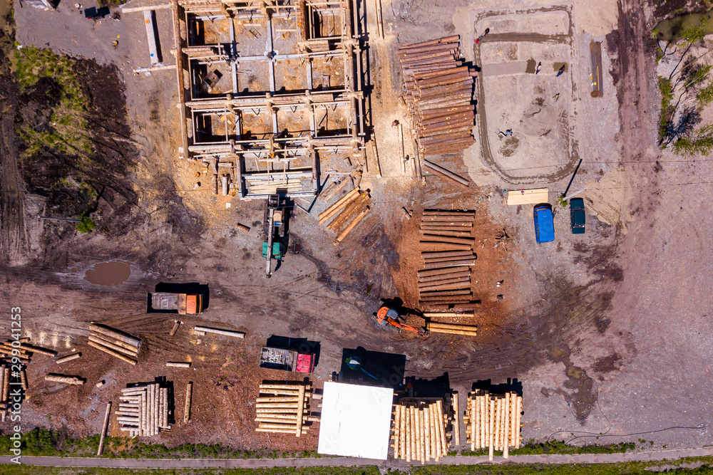 Aerial view of the construction site during the building of a wooden ...