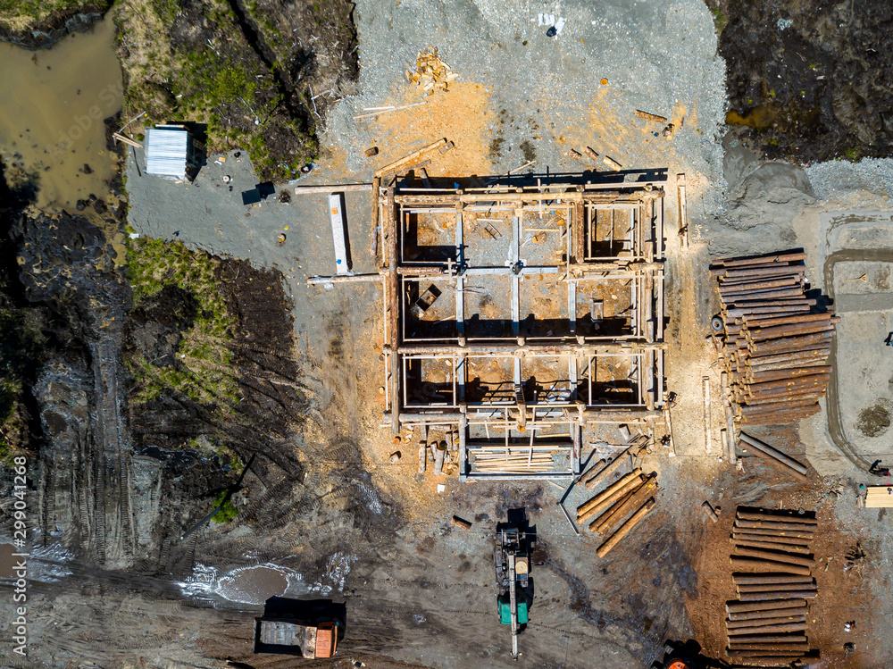 Aerial view of the construction site during the building of a wooden ...
