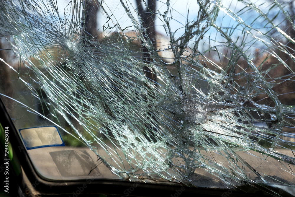 Broken car after an accident. Broken car glass. Broken windshield of ...