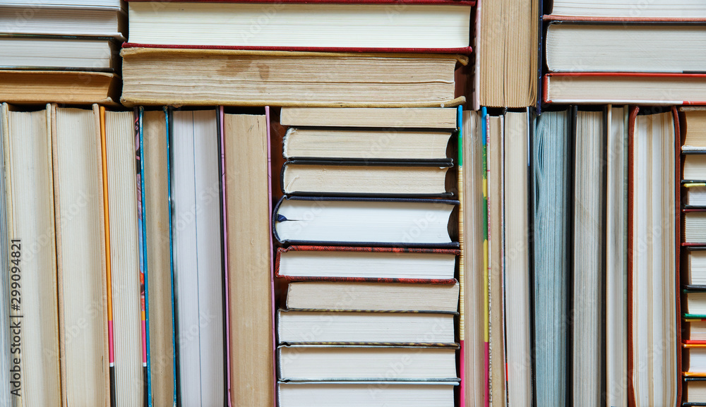 Books stack texture and background Stock Photo | Adobe Stock