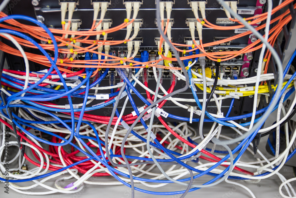 cable network in server room cable tangled of poorly routed cables ...