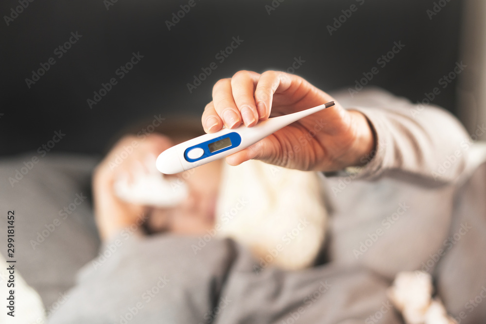 Disease. Home treatment. Flu and the common cold. A woman is sick at ...